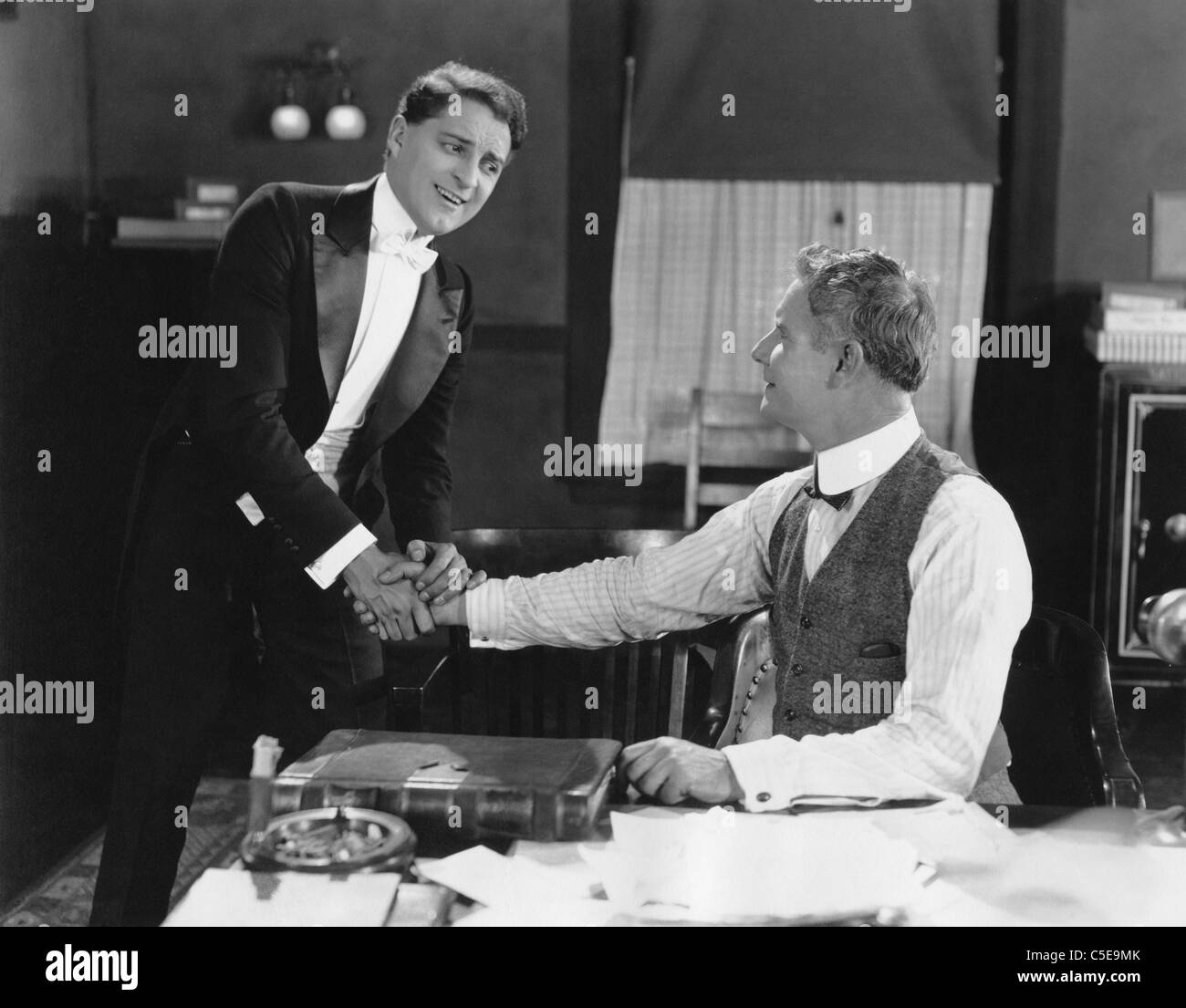 Two men shaking hands Stock Photo - Alamy