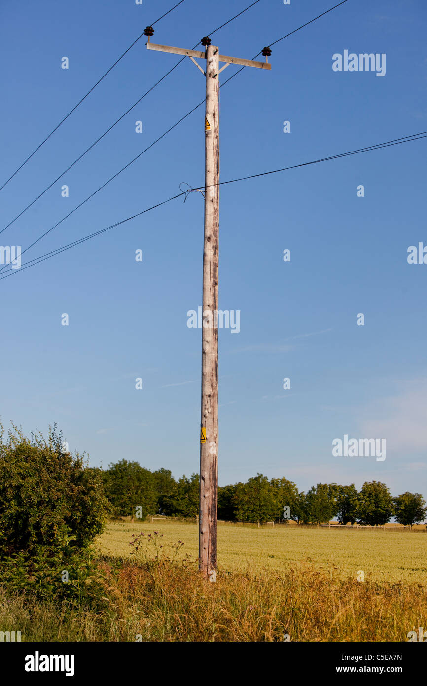 A utility pole in the country field Stock Photo - Alamy