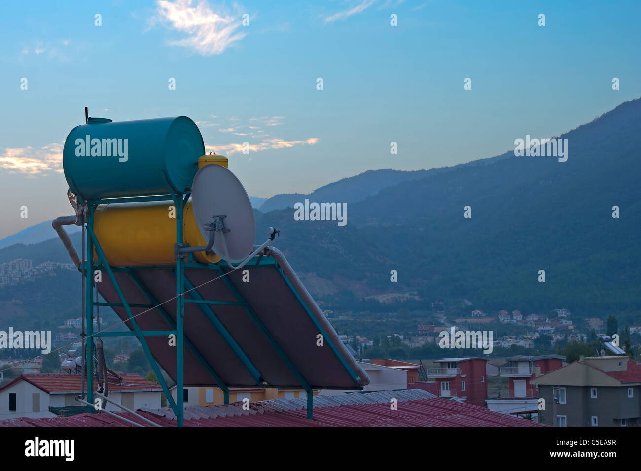 Rooftop hot water solar heating systems Stock Photo - Alamy