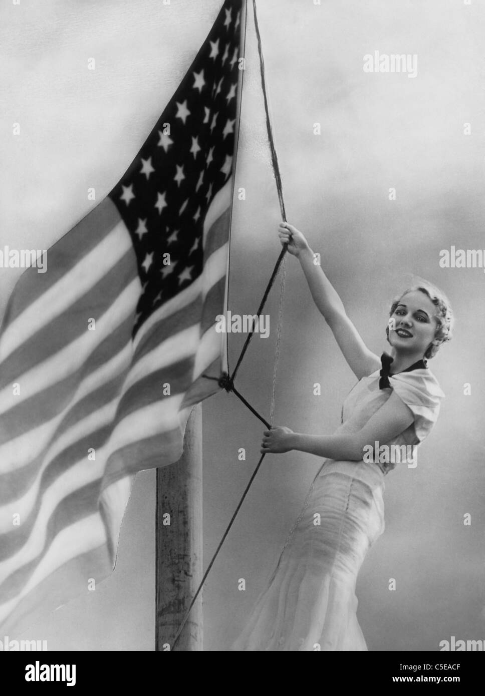 Black woman holding american flag Black and White Stock Photos & Images ...