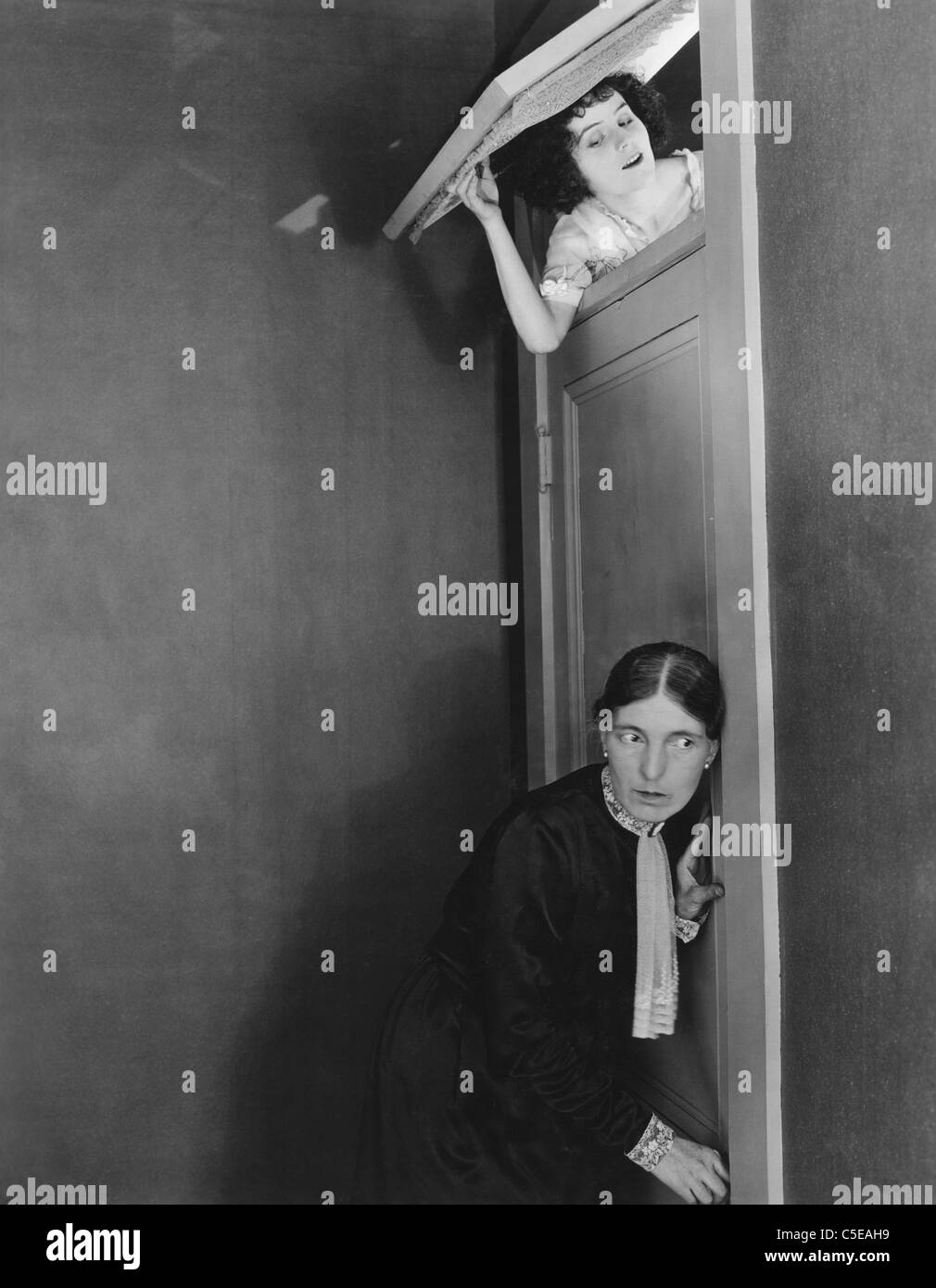 Eavesdrop Black and White Stock Photos & Images - Alamy