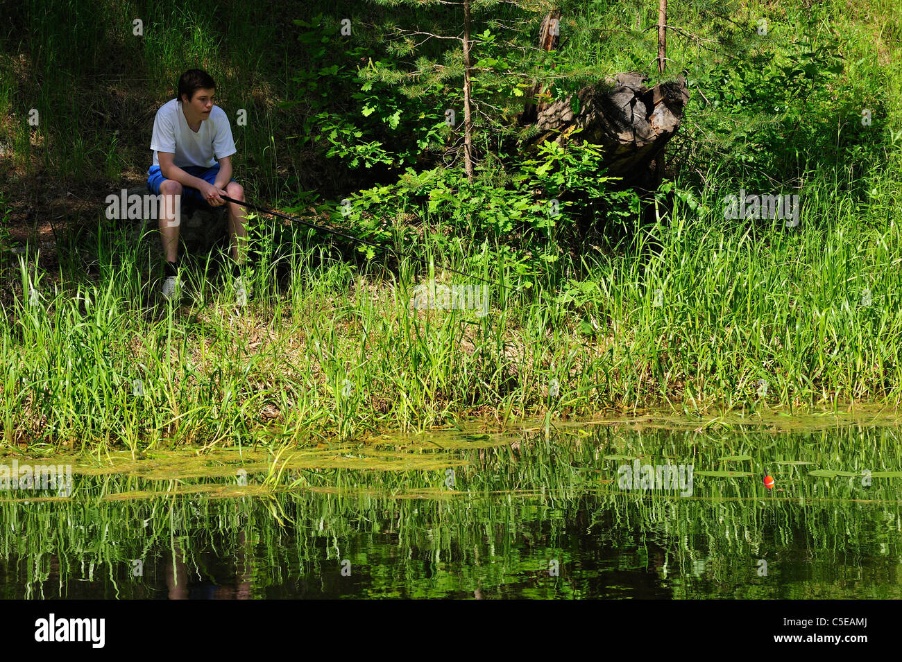Man boy fly fishing hi-res stock photography and images - Alamy