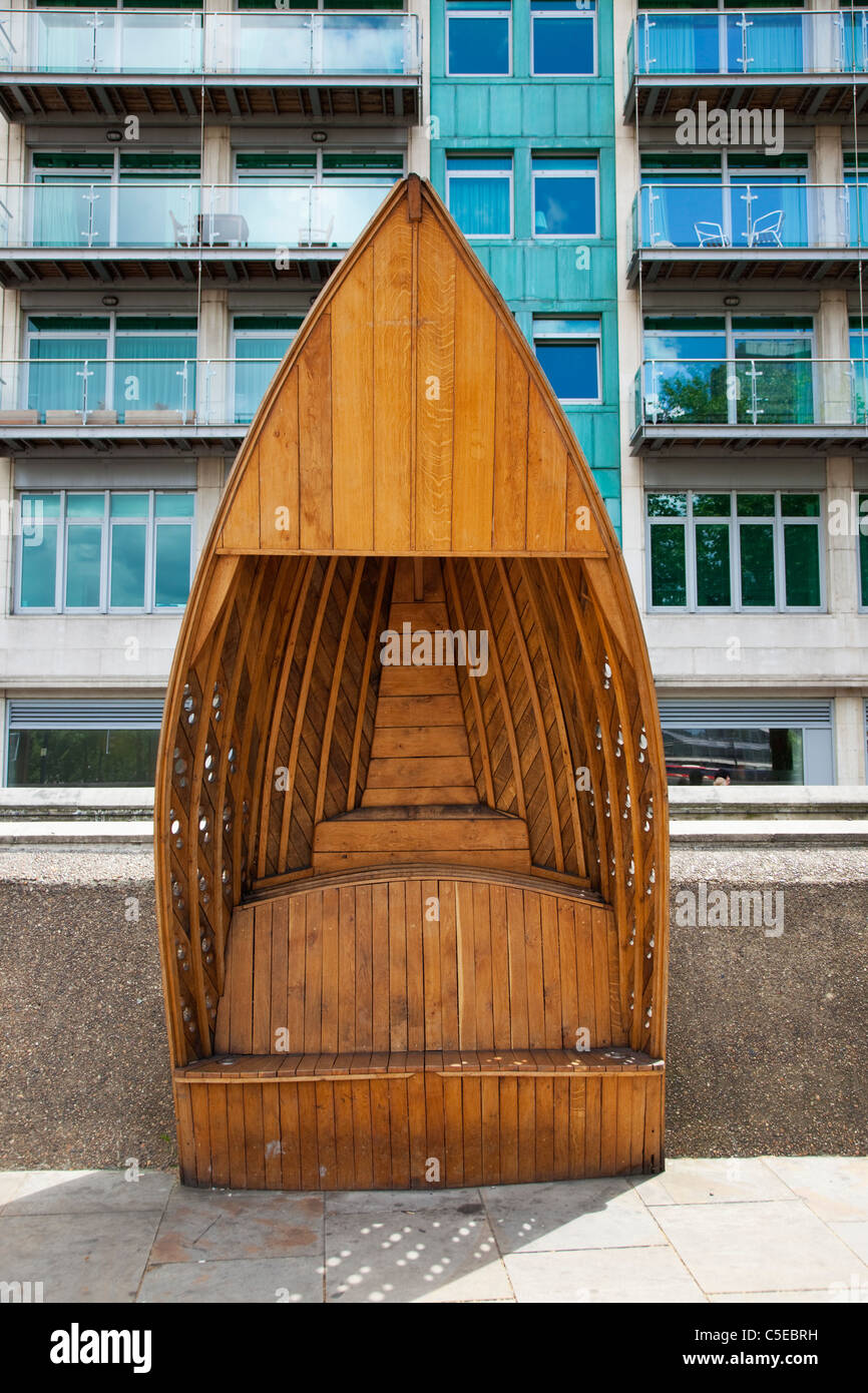 England, London, Vauxhall, Albert embankment, benches made from wood in ...