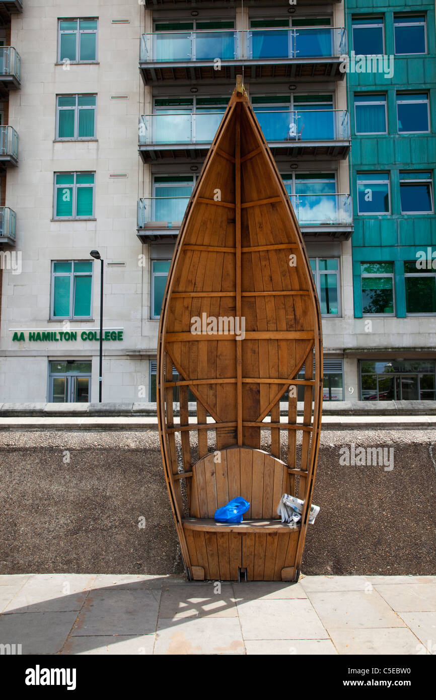 England, London, Vauxhall, Albert embankment, benches made from wood in ...