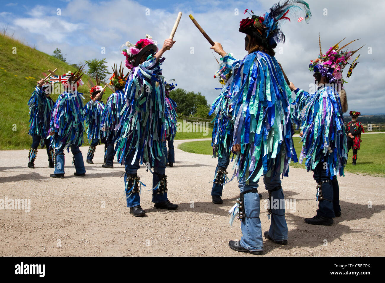 Exmoor Border Morris Dancers, black-faced, wearing long flowing torn ...