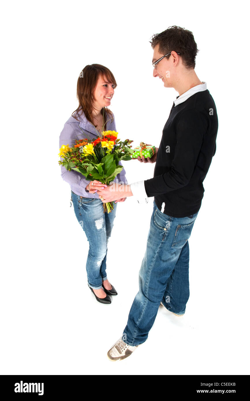 Girl is getting present and flowers from her boyfriend Stock Photo - Alamy