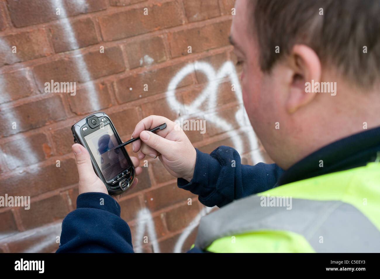 Council workers clean graffiti hi-res stock photography and images - Alamy
