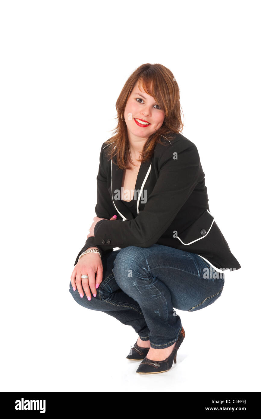 Happy cower girl with pumps in the studio Stock Photo - Alamy