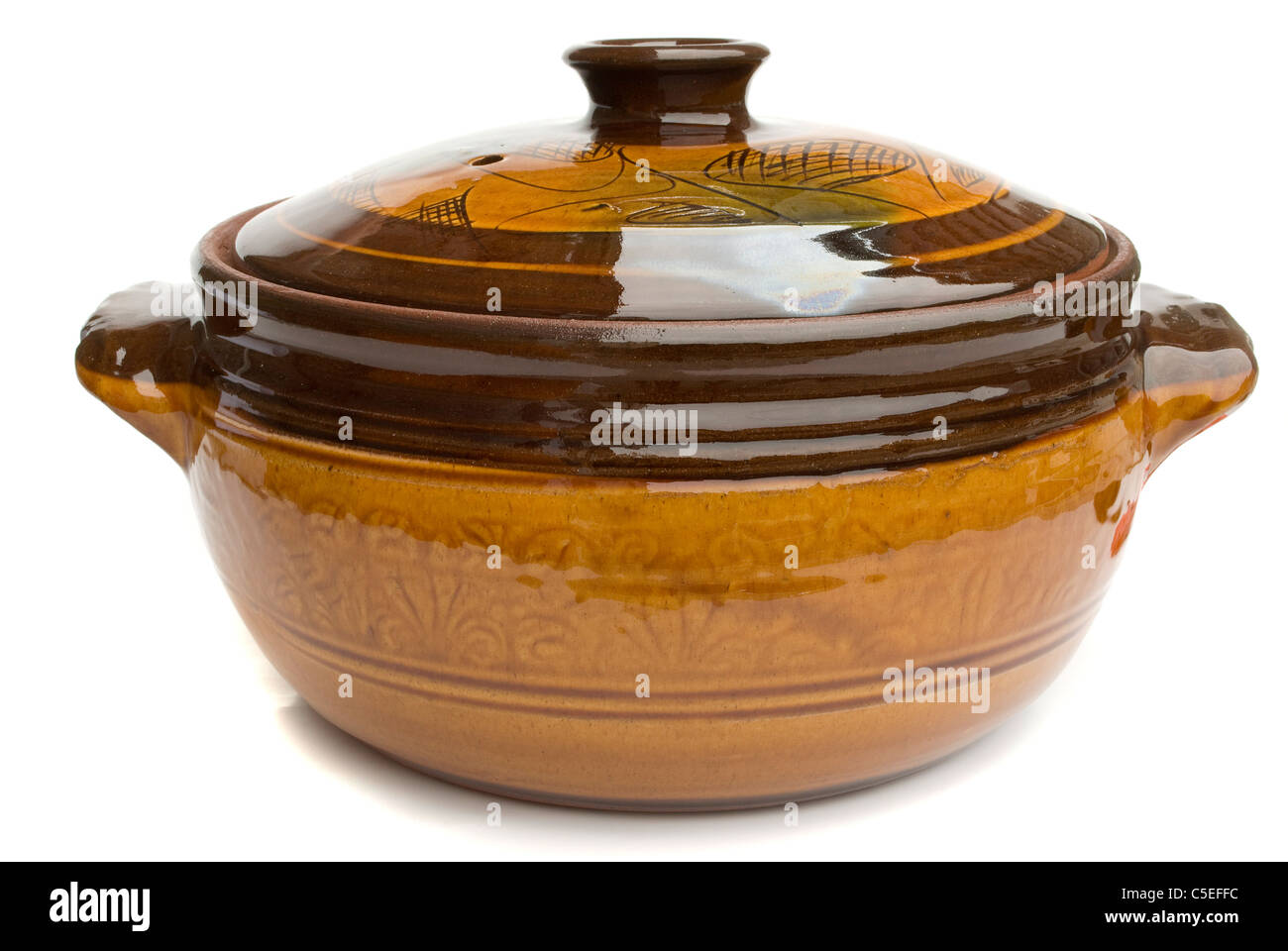 Clay pot for cooking isolated on white background Stock Photo - Alamy