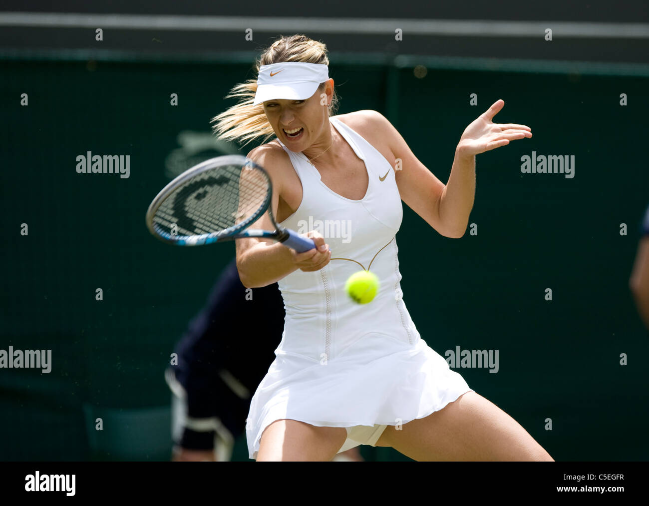 Maria Sharapova (RUS) in action during the 2011 Wimbledon Tennis ...