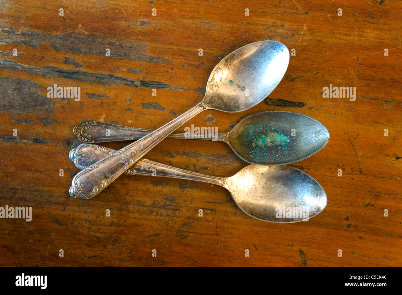 spoons on old table Stock Photo - Alamy