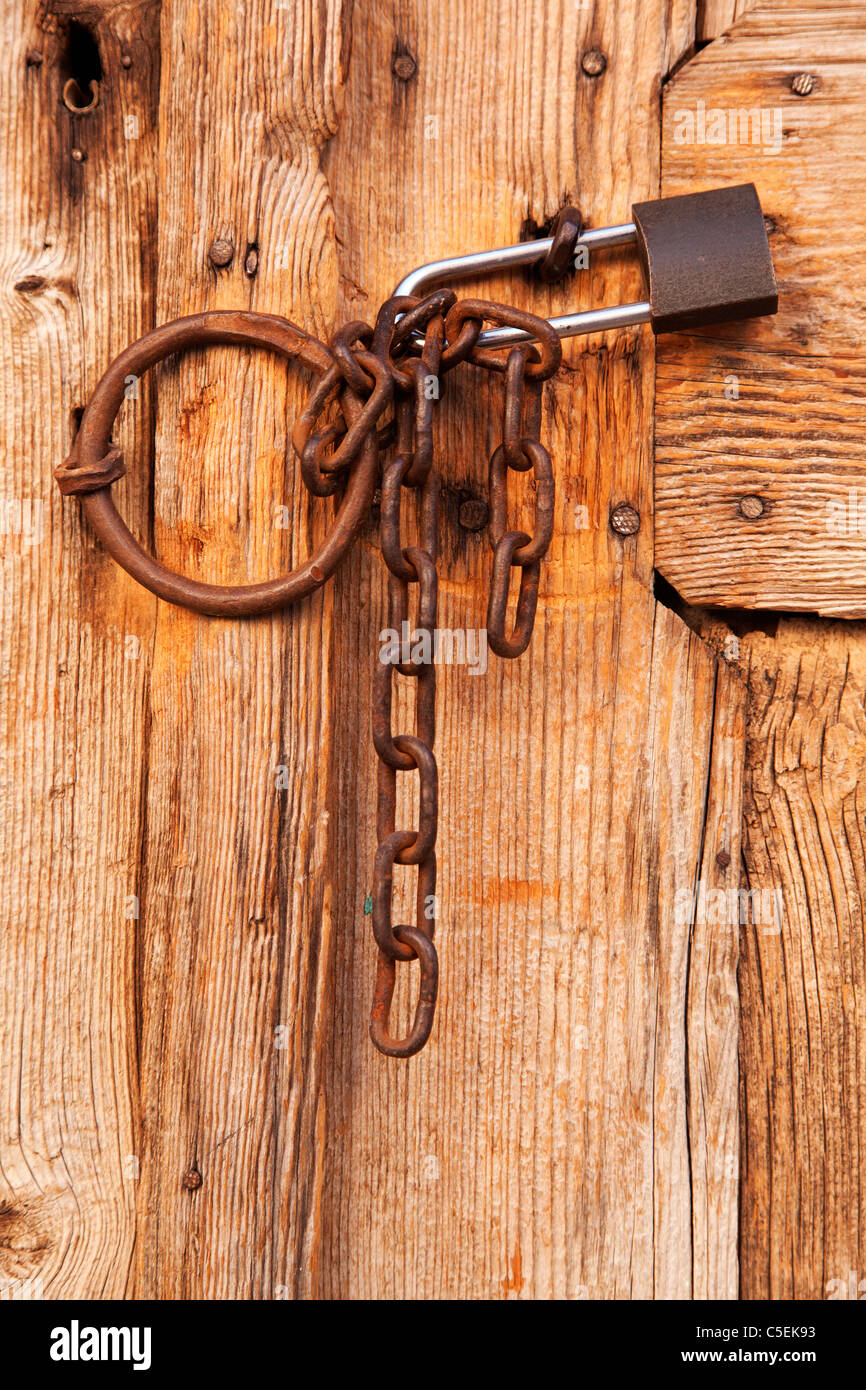 Chained and locked doors Stock Photo - Alamy