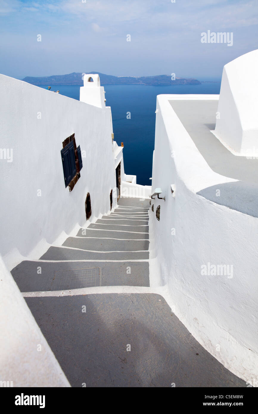 Santorini steps leading down towards the caldera, cyclades. Thira town ...