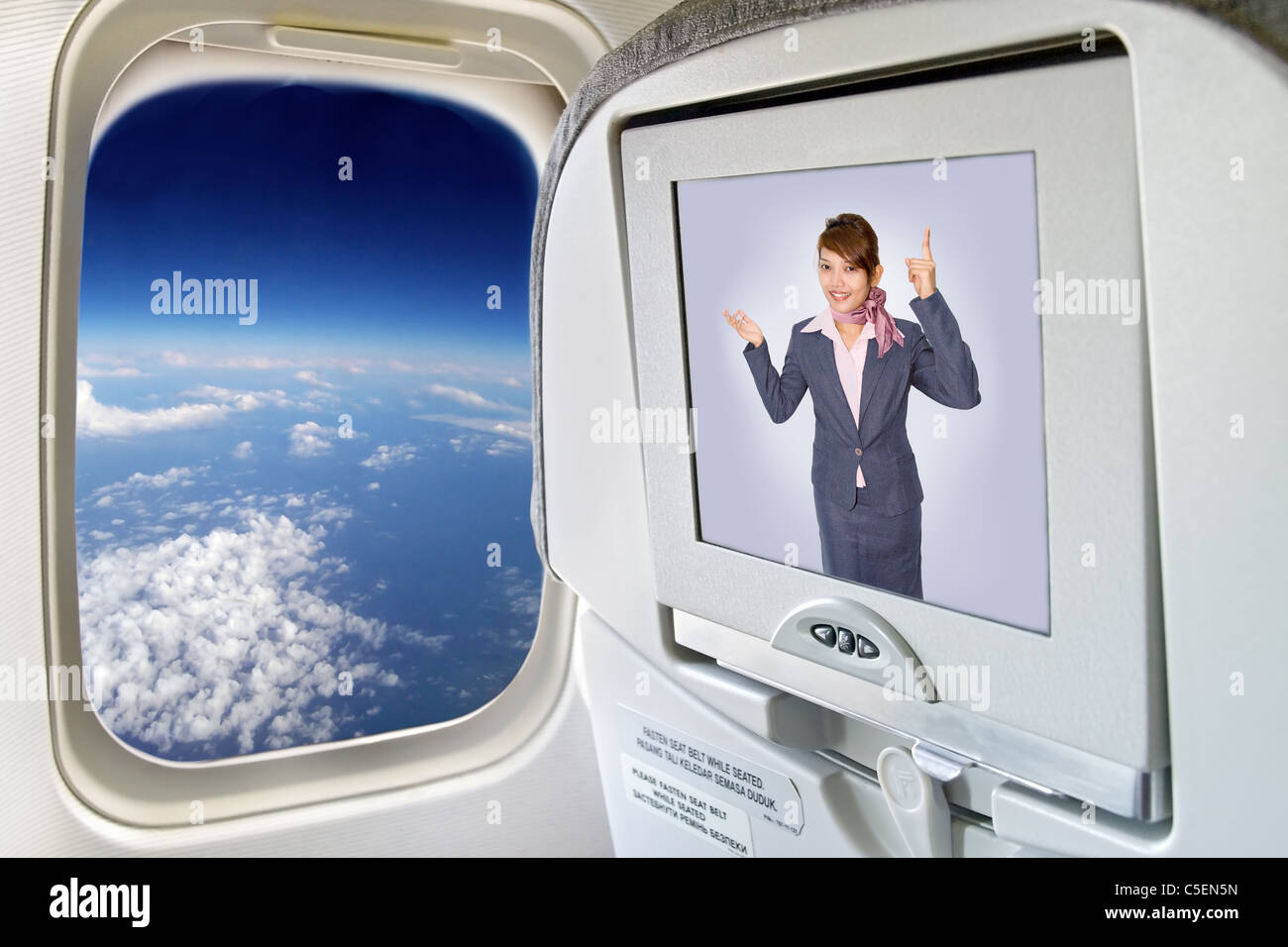 Monitor and a window on the plane Stock Photo - Alamy