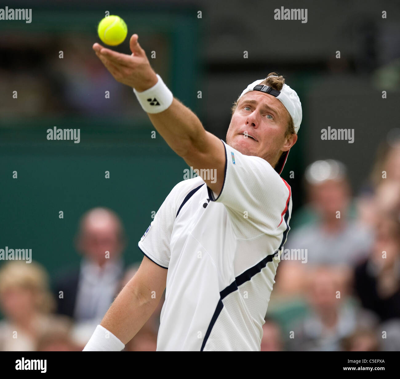 Lleyton Hewitt (AUS) in action during the 2011 Wimbledon Tennis ...
