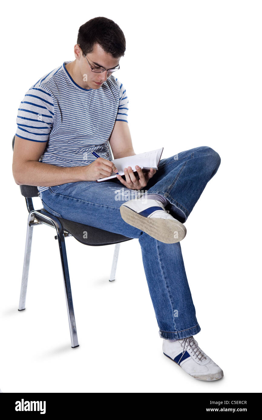 Student with a notebook sits on a chair isolated a white background ...
