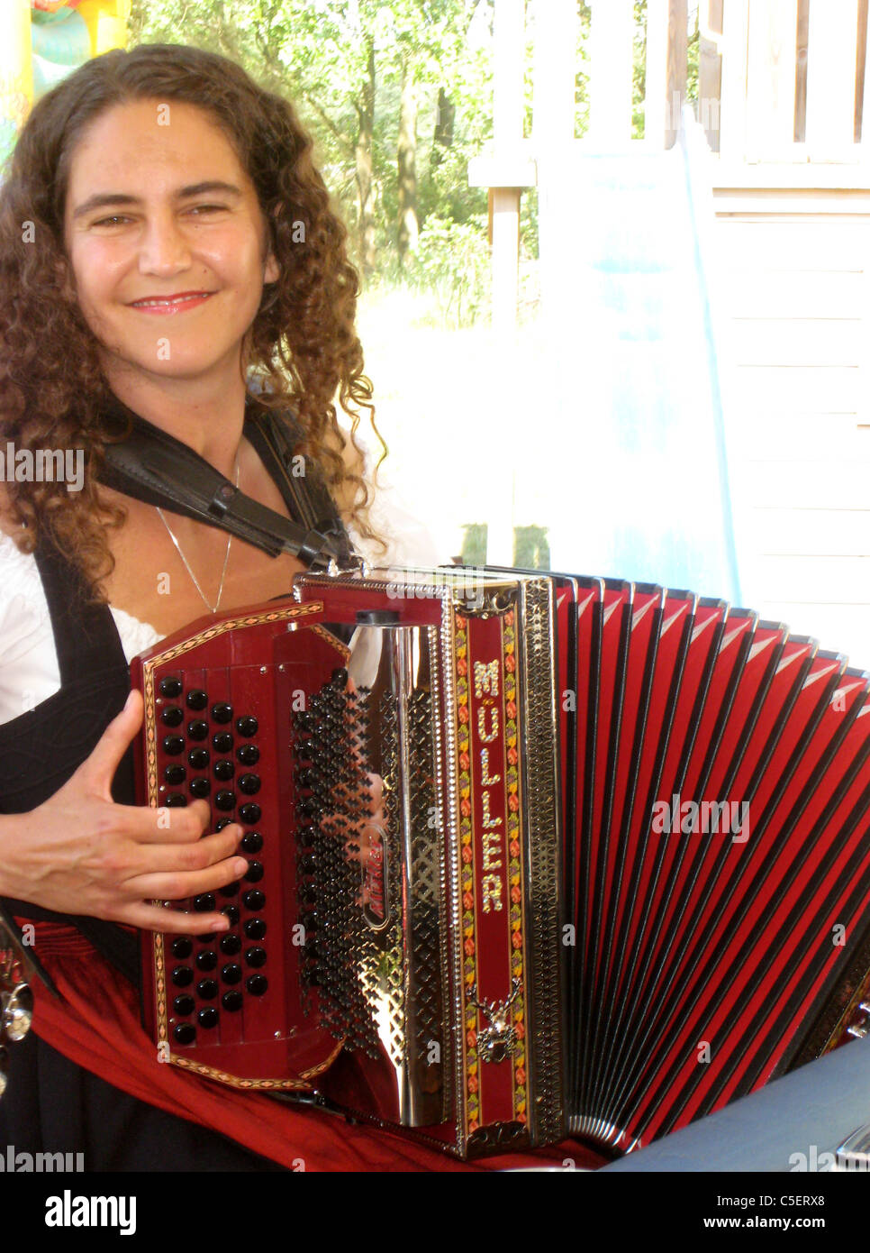 Lady playing the accordion hi-res stock photography and images - Alamy
