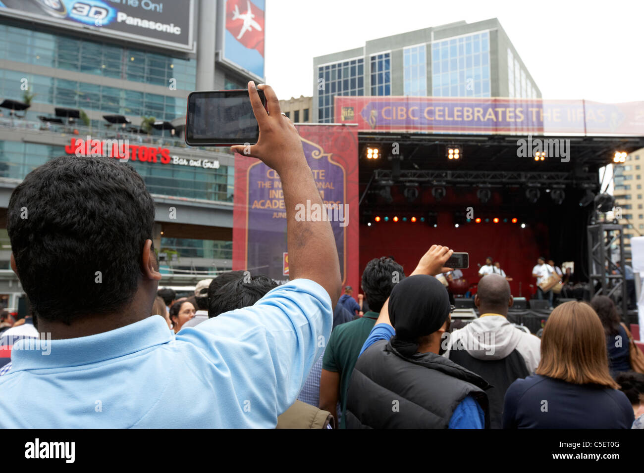 Taking photo of crowd hi-res stock photography and images - Alamy