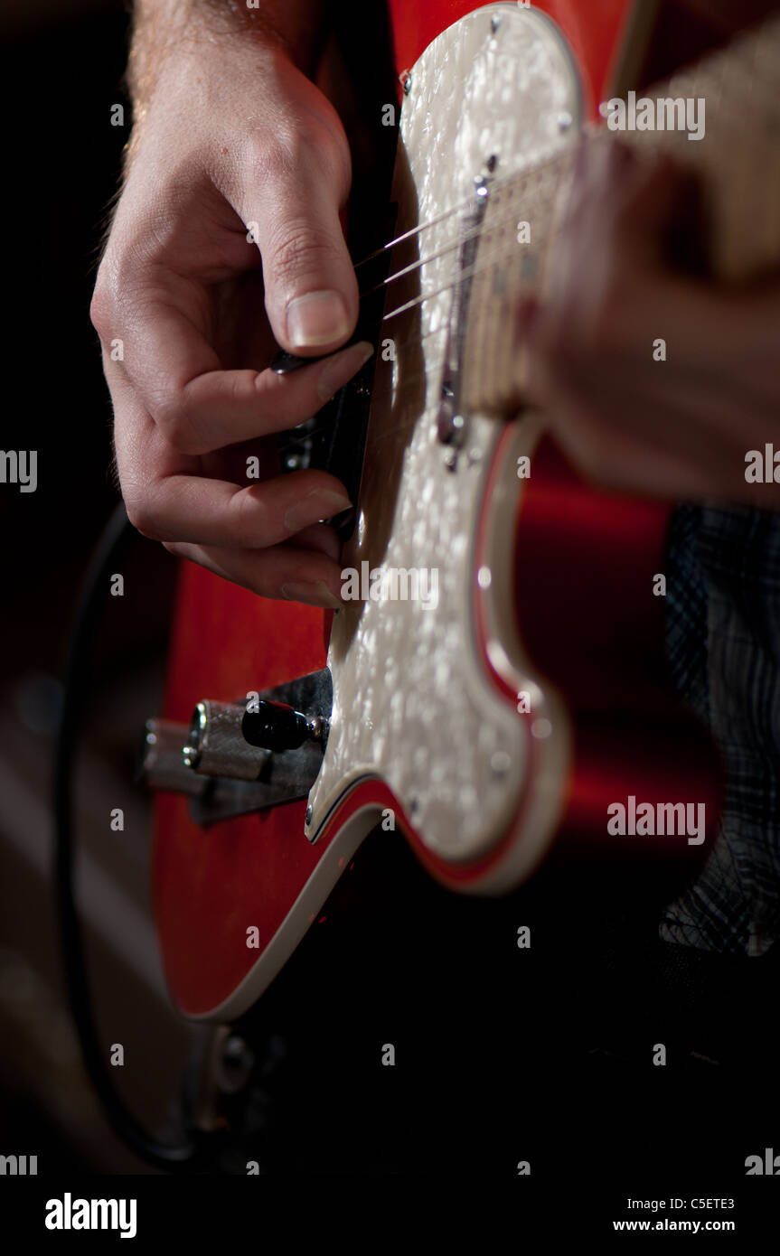 Musician Playing a Guitar Stock Photo - Alamy