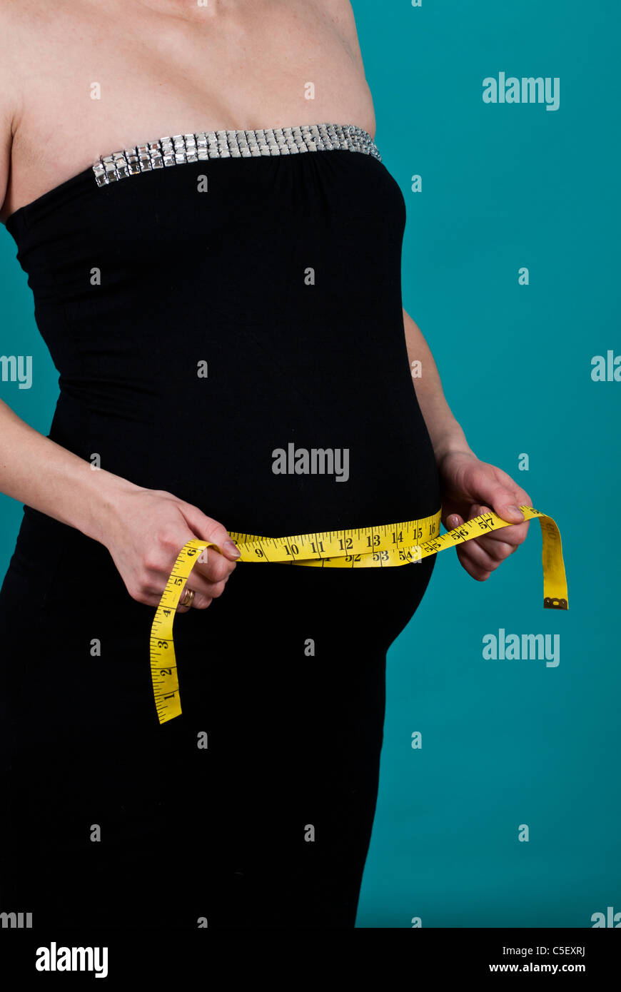 Pregnant Woman Measuring Bump High Resolution Stock Photography and ...