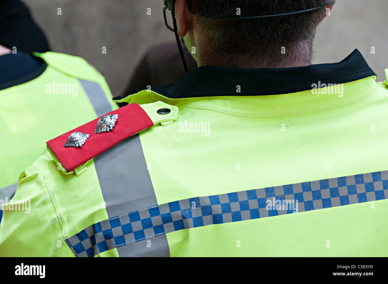 the red lapel badge of a police inspector in the uk Stock Photo - Alamy