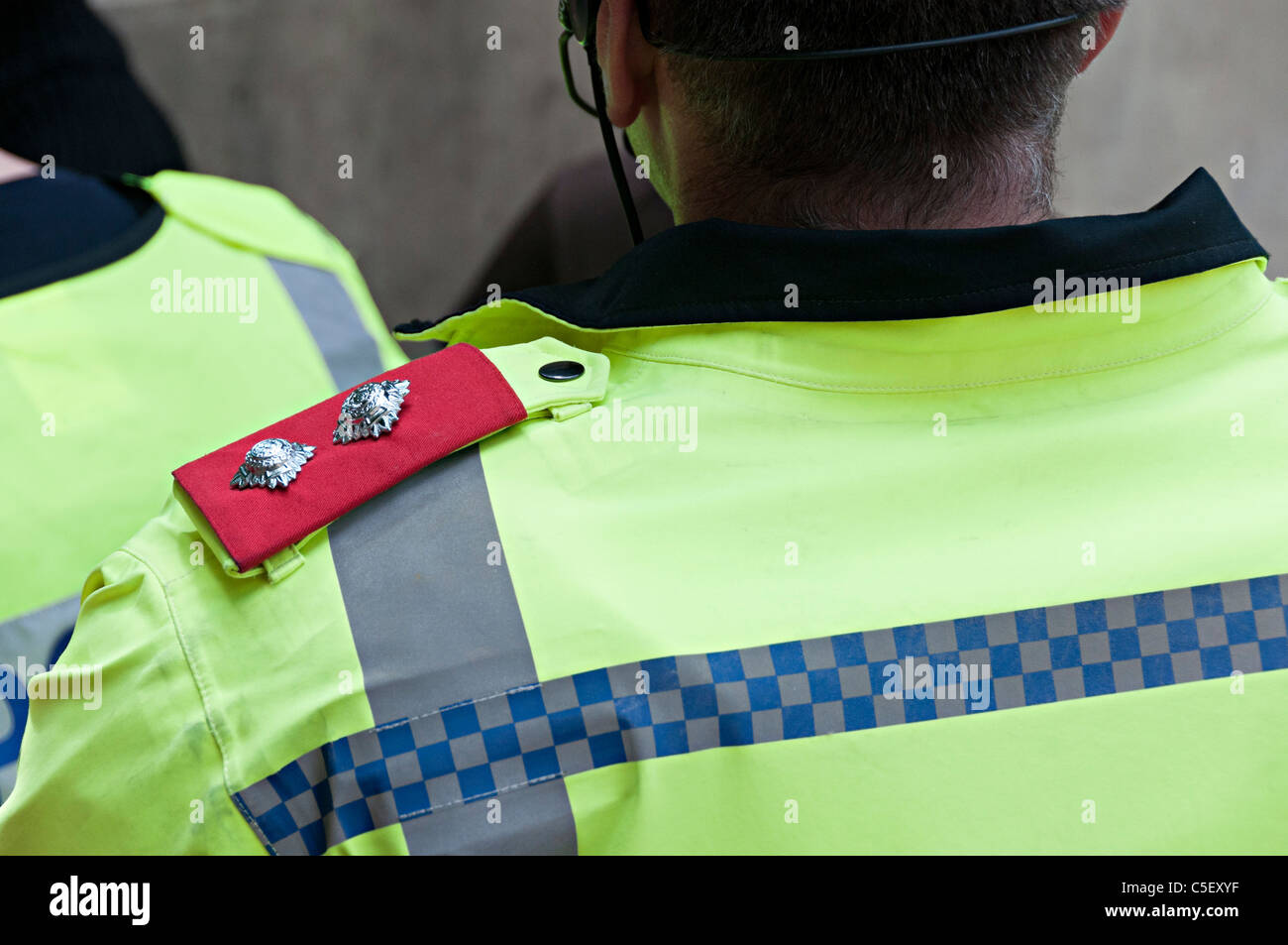 the red lapel badge of a police inspector in the uk Stock Photo - Alamy