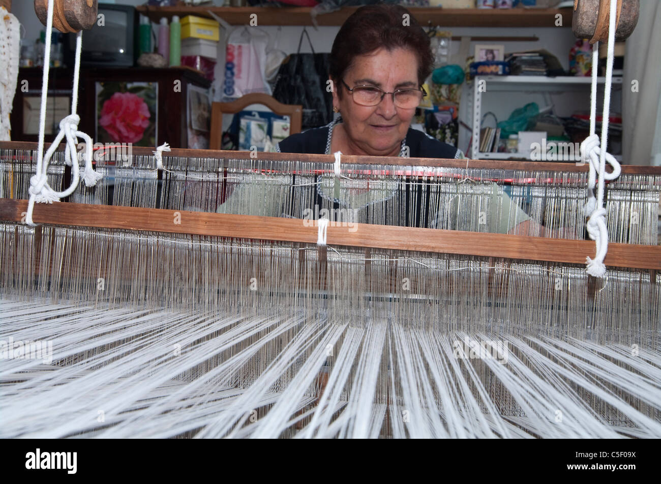 A traditional woman weaver working at his loom Stock Photo - Alamy