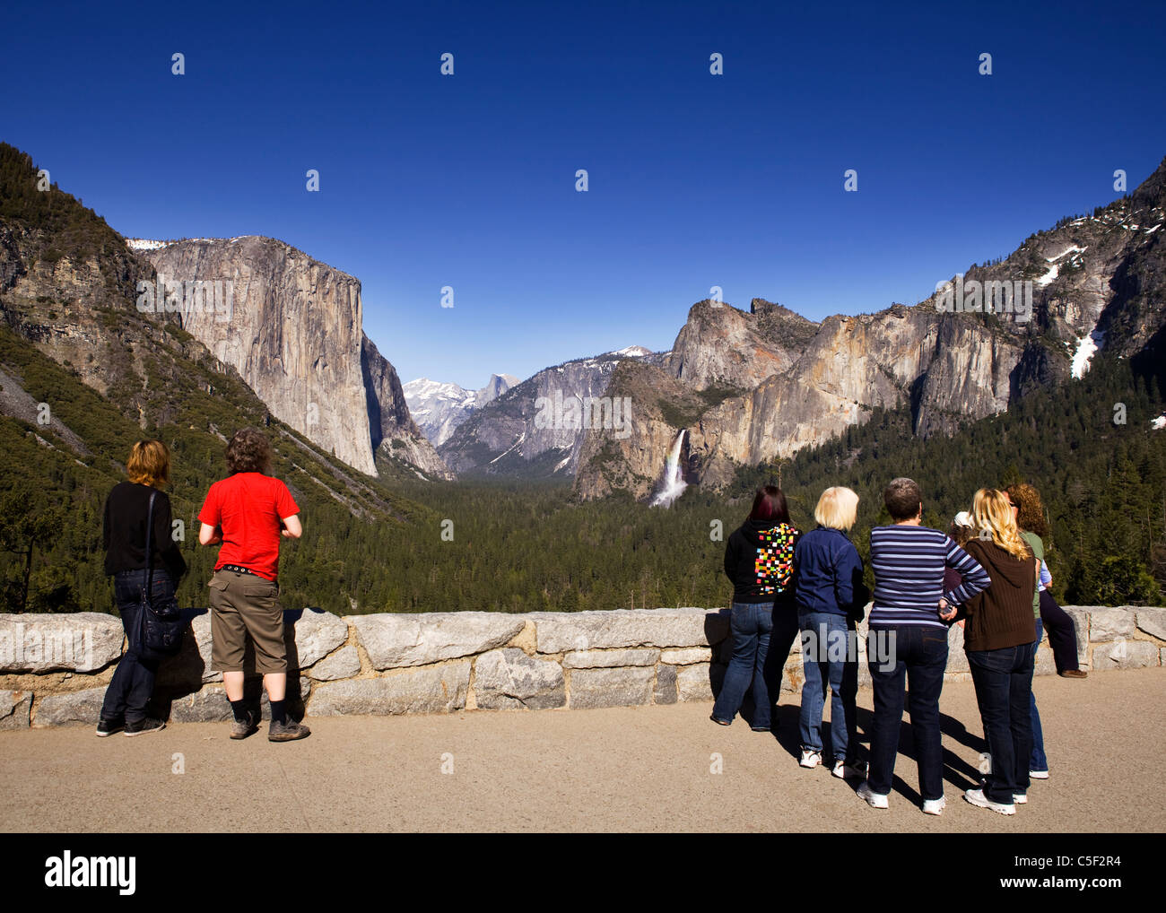 Visitors enjoy the grand view of Yosemite Valley from Tunnel View ...