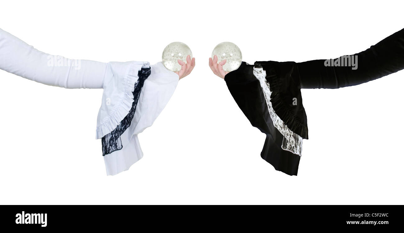 White and black gothic lace outfits holding out crystal balls - path ...