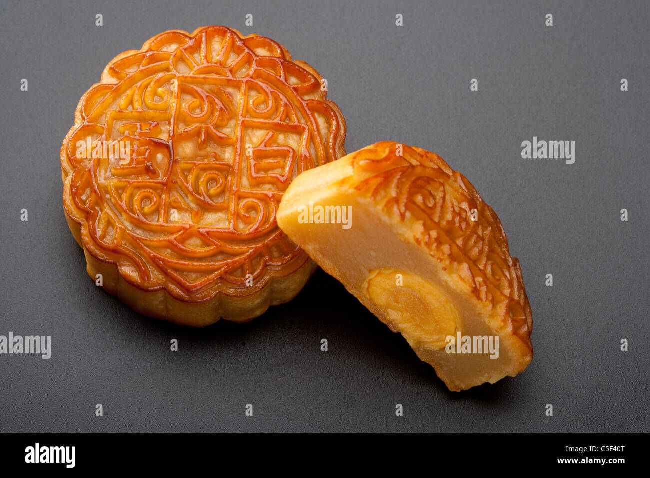 Moon Cakes, One Cut to Reveal Filling Stock Photo - Alamy