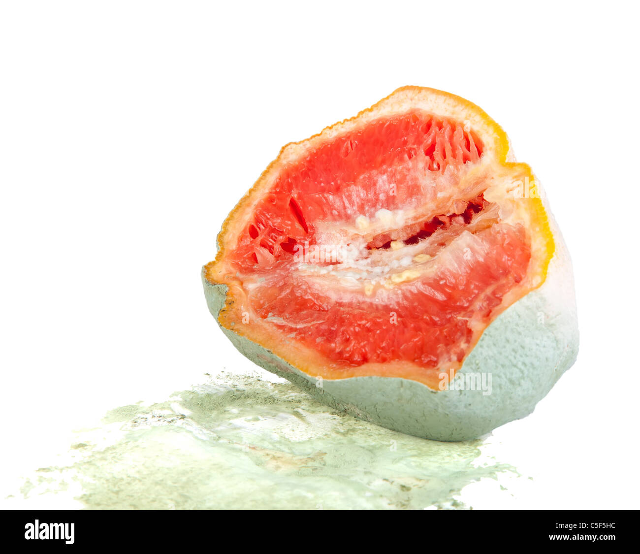 Rotten grapefruit half isolated on white background Stock Photo - Alamy