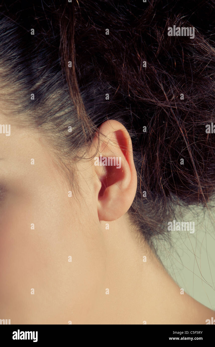 Womans ear detail hi-res stock photography and images - Alamy