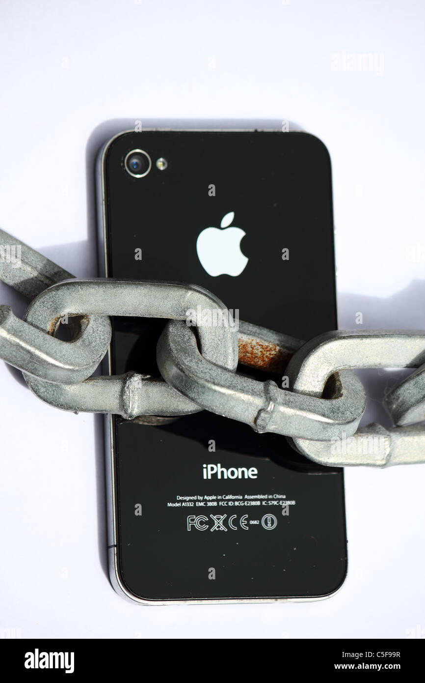 iPhone locked with a large thick chain , conceptual image Stock Photo ...