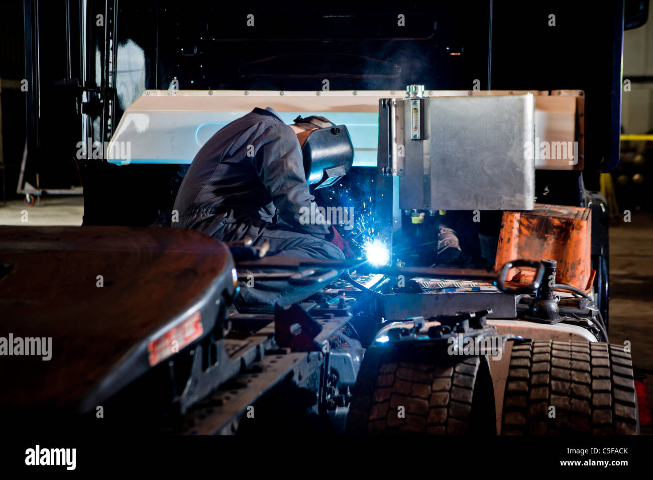 Man welding on truck hi-res stock photography and images - Alamy