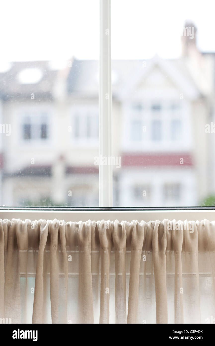 View of suburban houses through window Stock Photo - Alamy