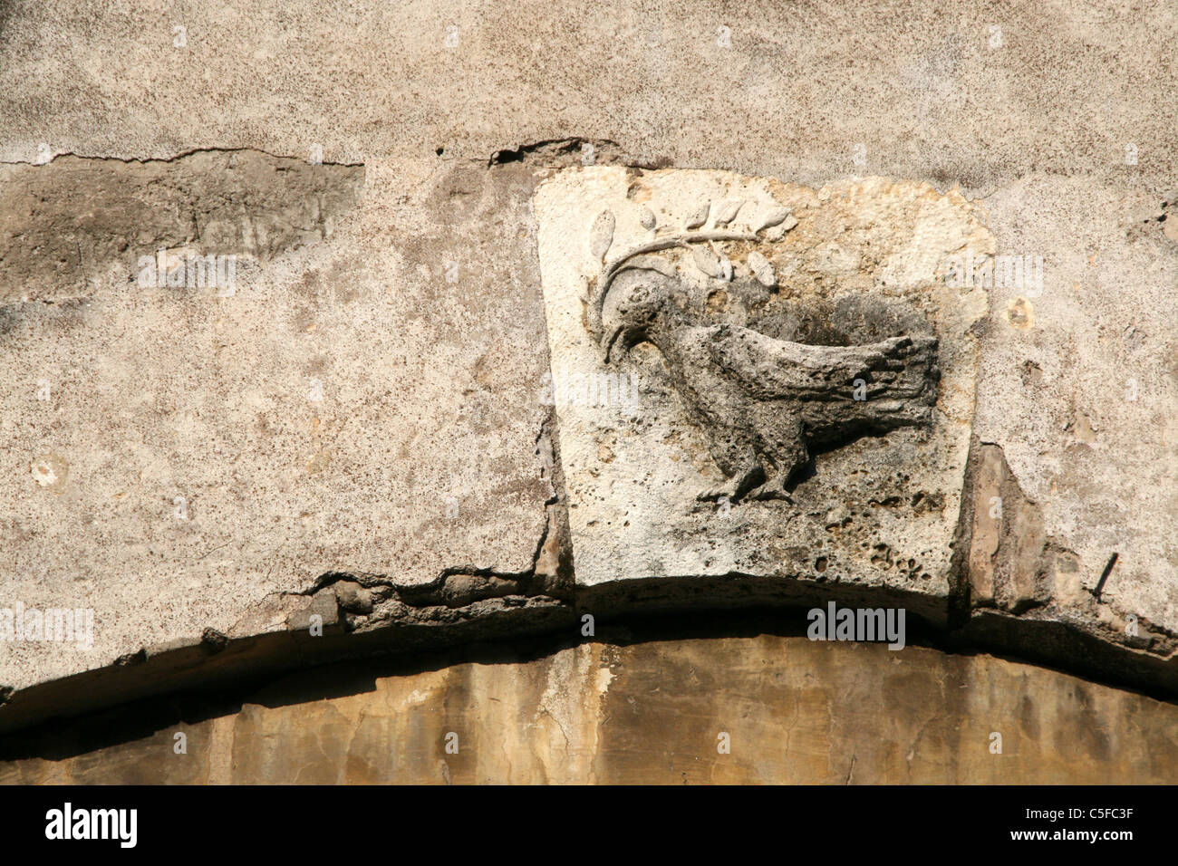 peace dove bird sculpture statue on door way arch in rome italy Stock ...