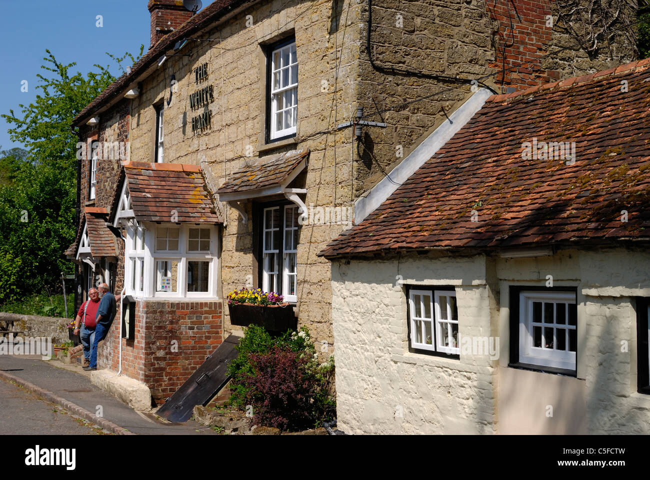 The White Hart Public House by the river Arun at Stopham. Near ...