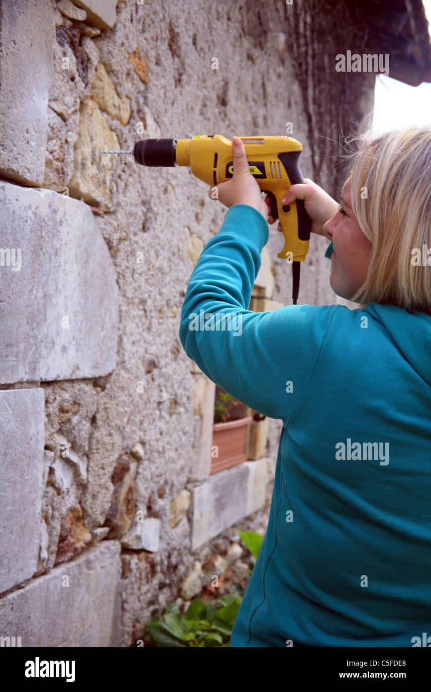 Woman doing DIY Stock Photo - Alamy