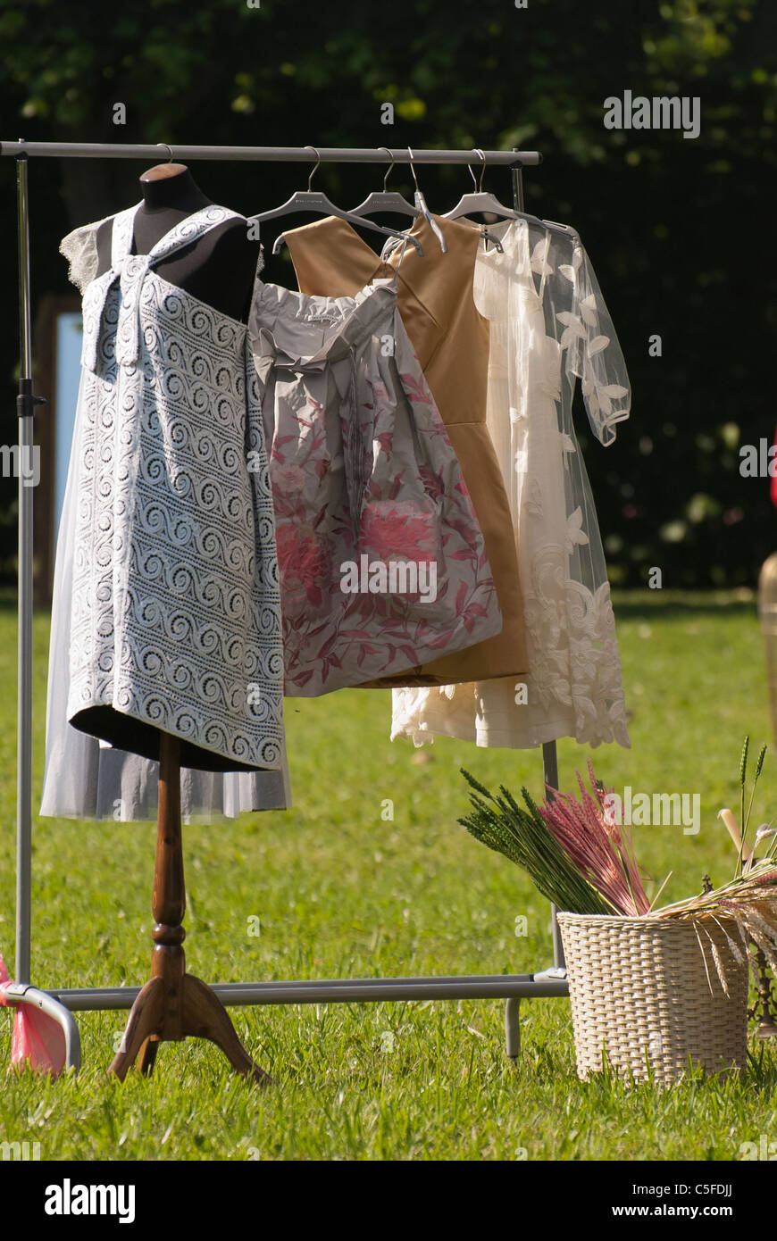 Clothes on hanger. Waitng for the start of the fashion parade en plein ...
