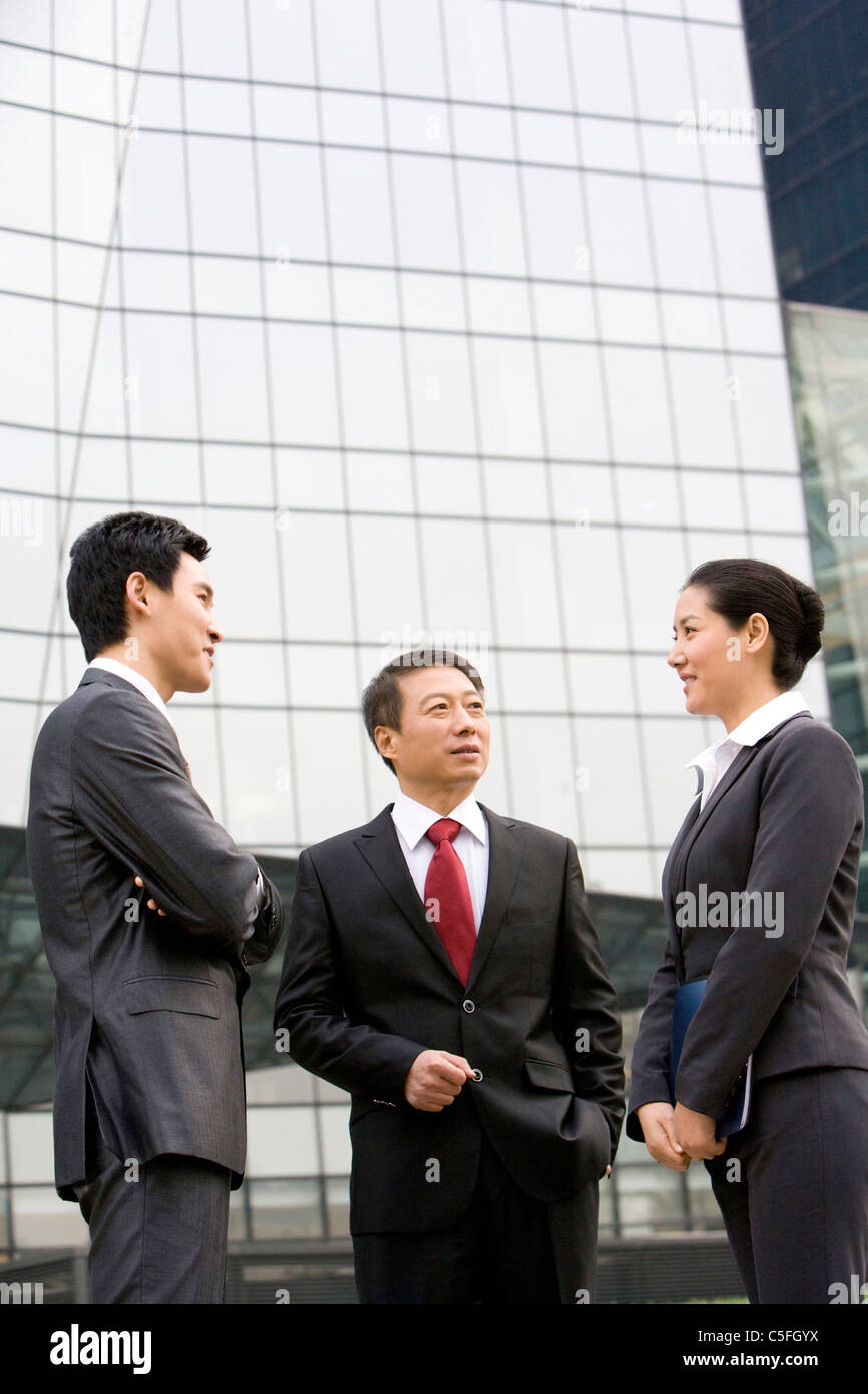 Businessmen in discussion Stock Photo - Alamy
