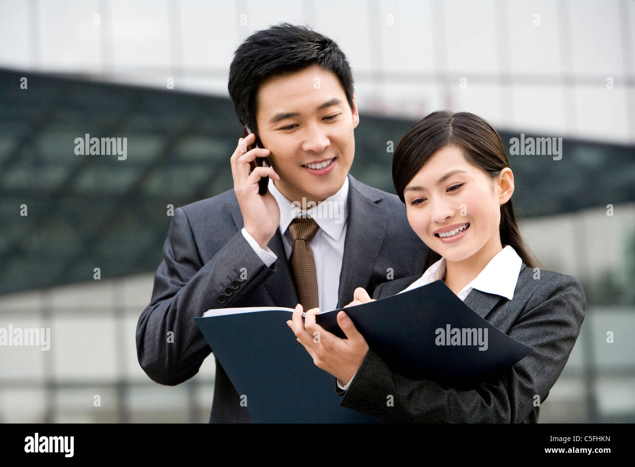 Businessmen in discussion Stock Photo - Alamy
