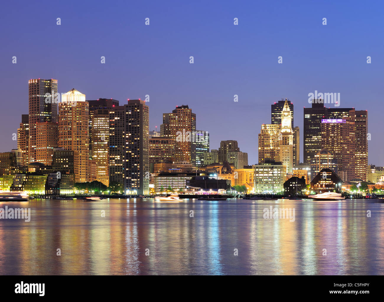 Boston downtown skyline panorama with skyscrapers over water with ...