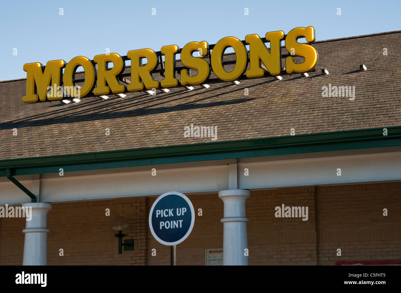 A landscape shot of a Morrisons sign and pick up point Stock Photo - Alamy
