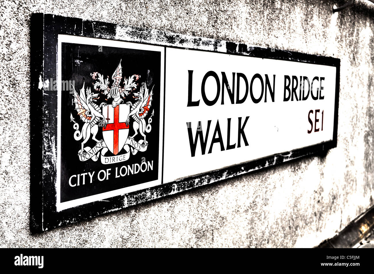 London Bridge Walk Road Sign on the edge of the bridge. This bridge is ...
