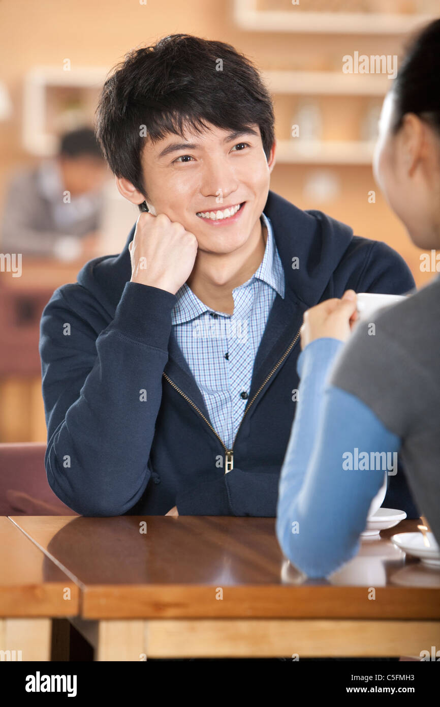 Man and woman talking over coffee Stock Photo - Alamy
