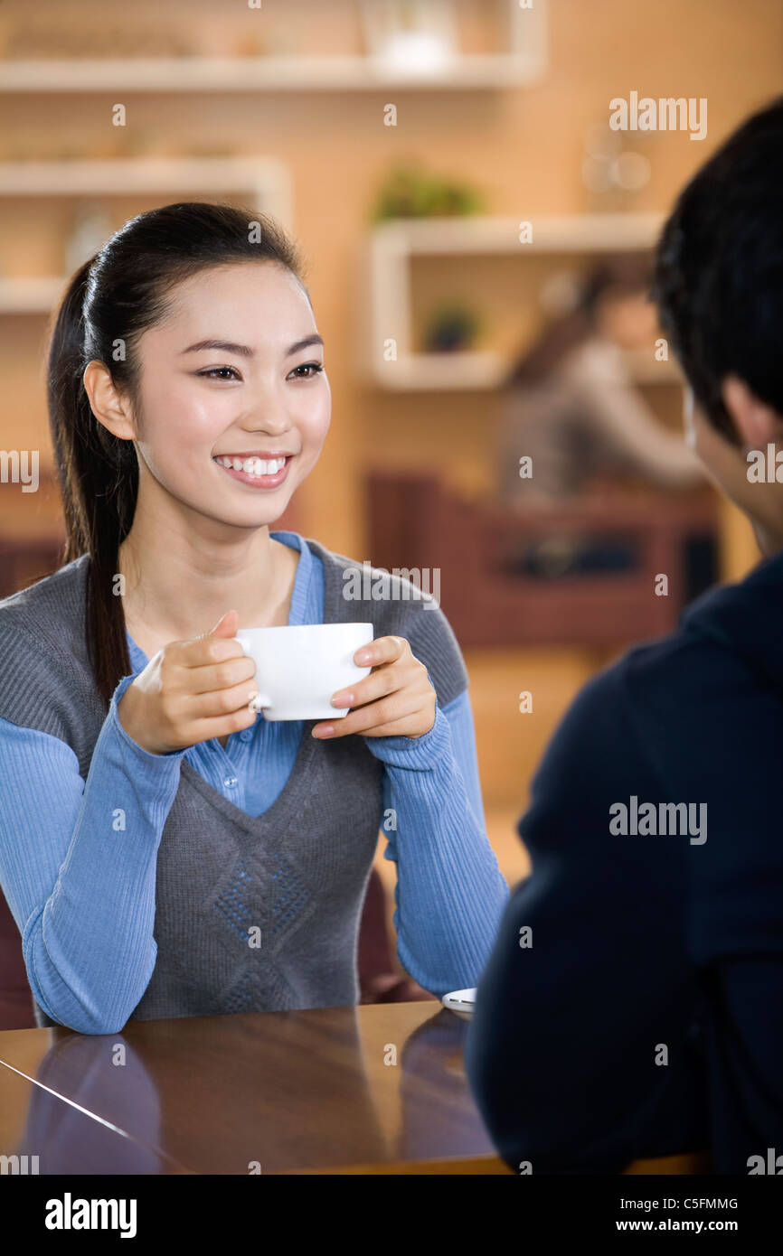 Man and woman talking over coffee Stock Photo - Alamy