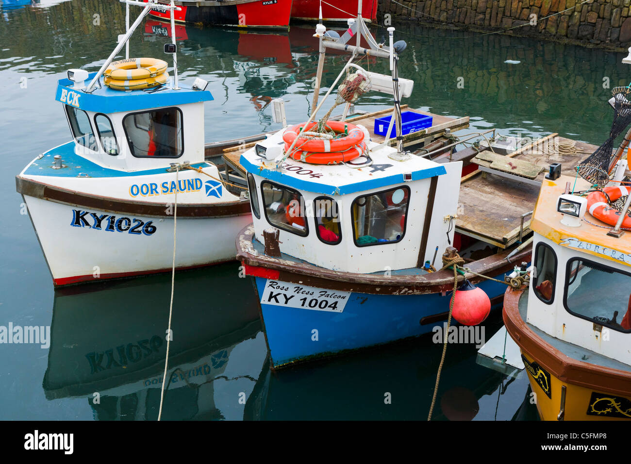 Local fishing boats in the harbour of the picturesque village of Crail ...