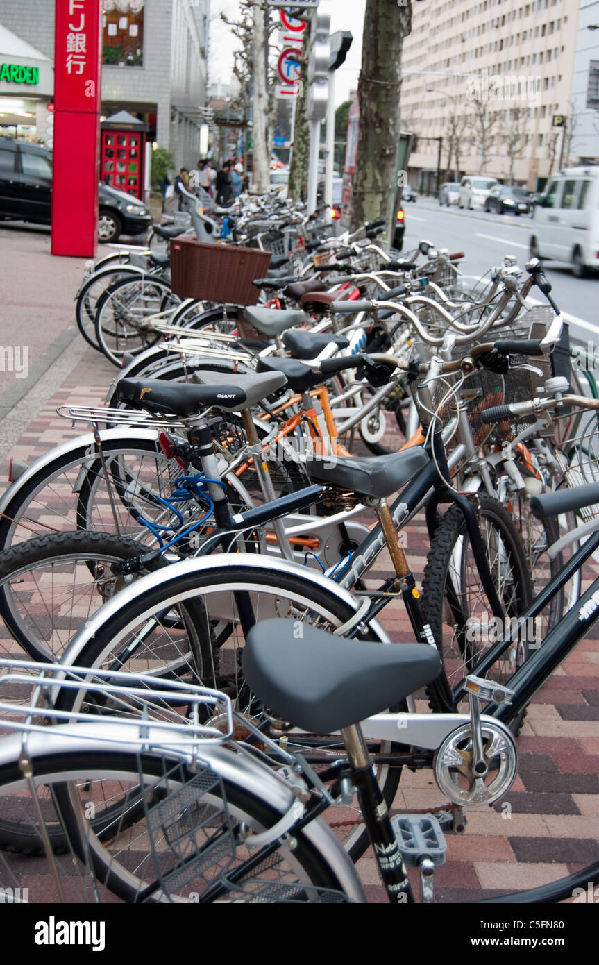 A line of bicycles in Tokyo Stock Photo - Alamy