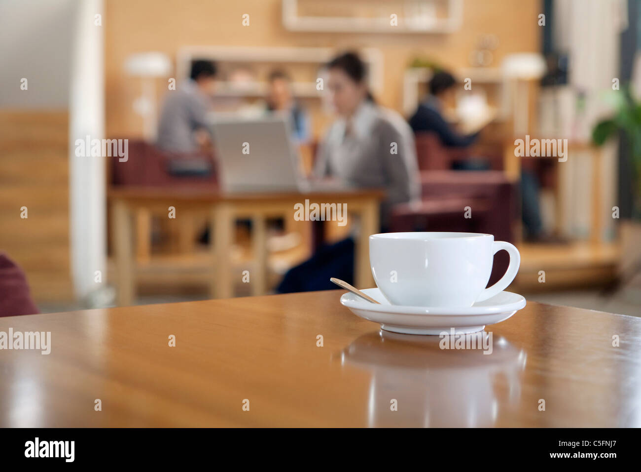A coffee cup on a table Stock Photo - Alamy