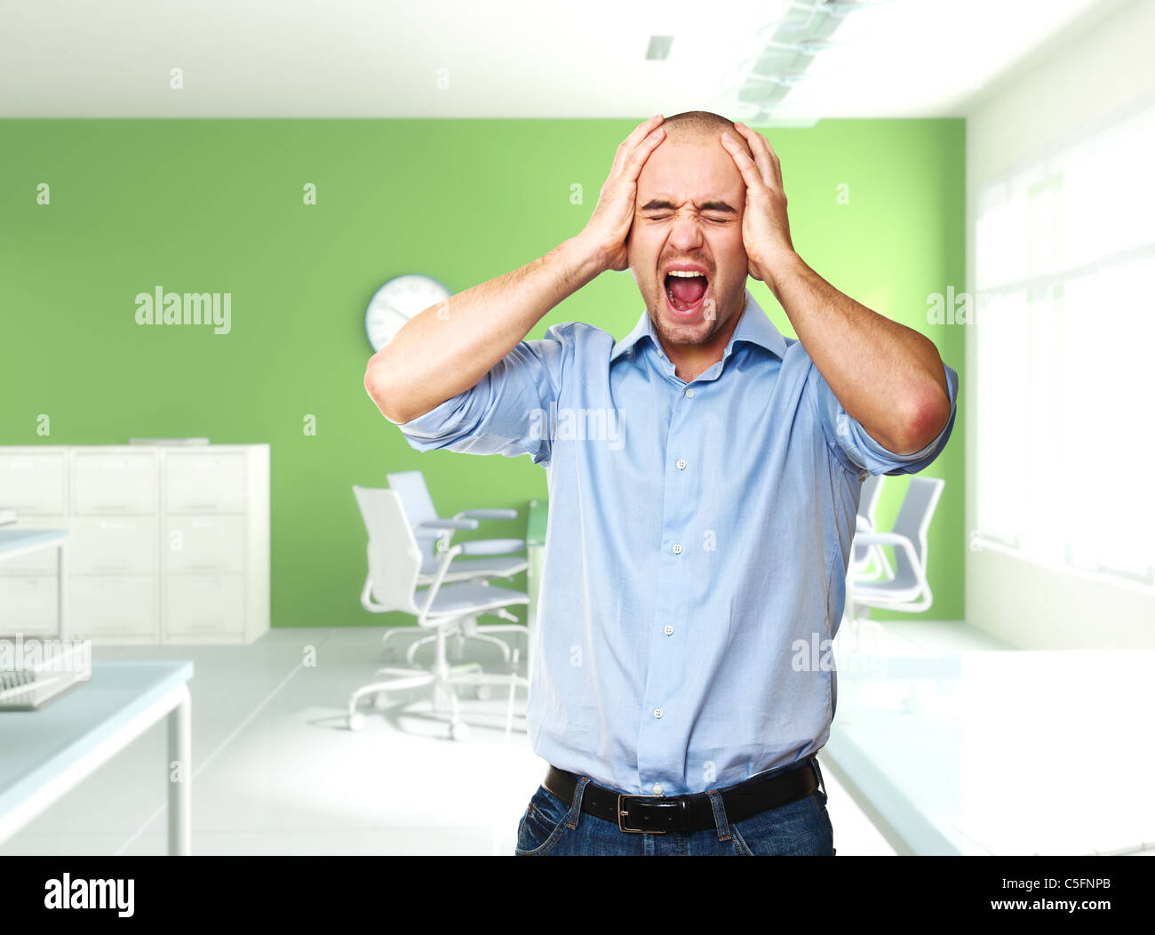 standing man getting crazy at work Stock Photo - Alamy
